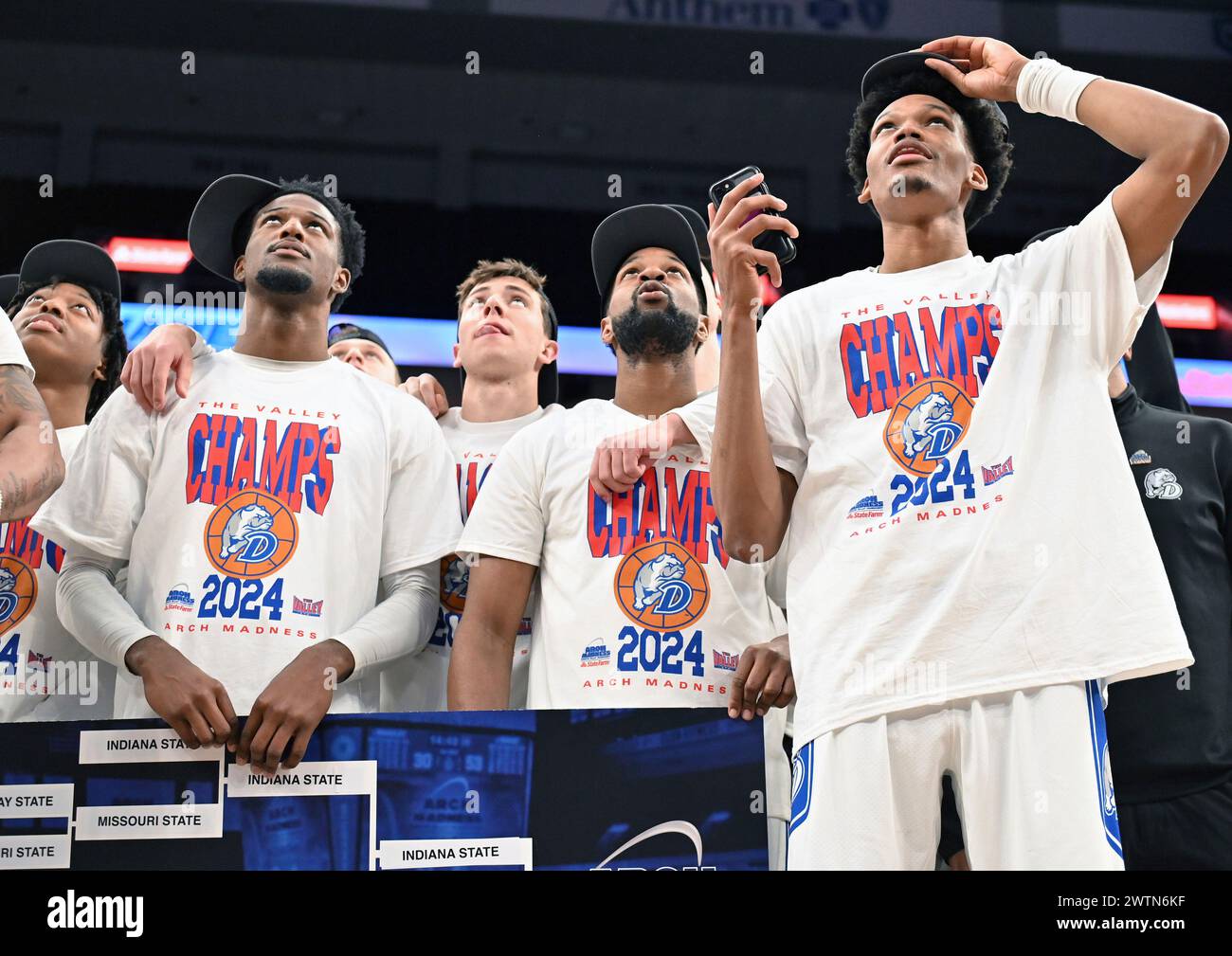 ST. LOUIS, MO - MARCH 10: Drake players watch the highlights of the ...