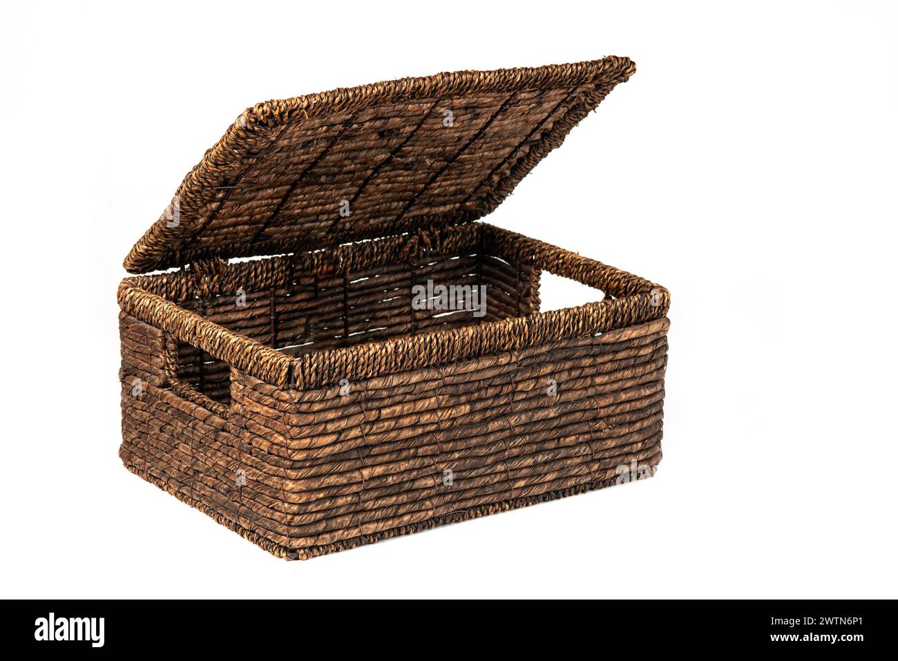 Open wicker box. Empty laundry basket. Object isolated on white ...