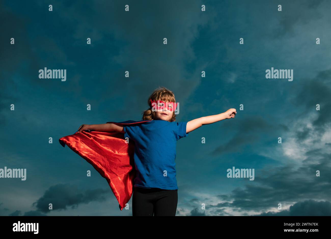 Little child superhero with hero cloak. Success, motivation concept ...