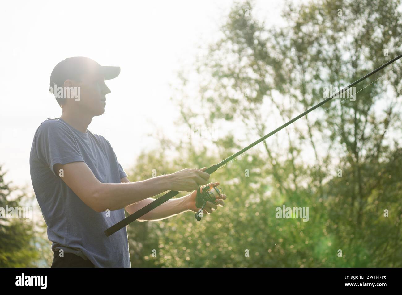 Man fisherman fishing rod hi-res stock photography and images - Alamy