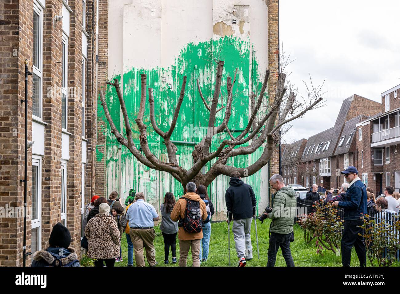 Banksy Tree artwork and street art at Christie Court, Hornsey Road ...