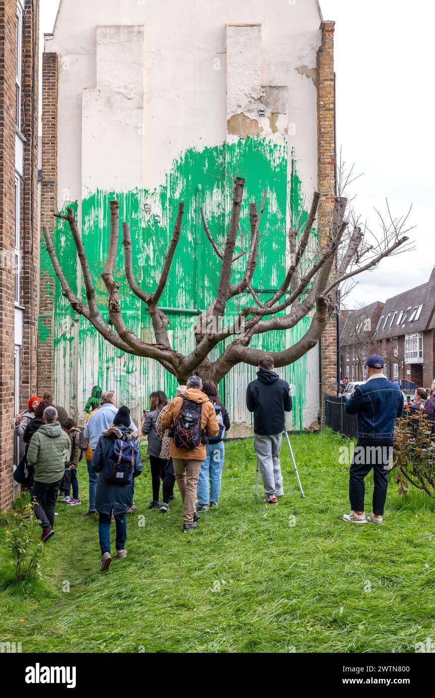 Banksy Tree artwork and street art at Christie Court, Hornsey Road ...