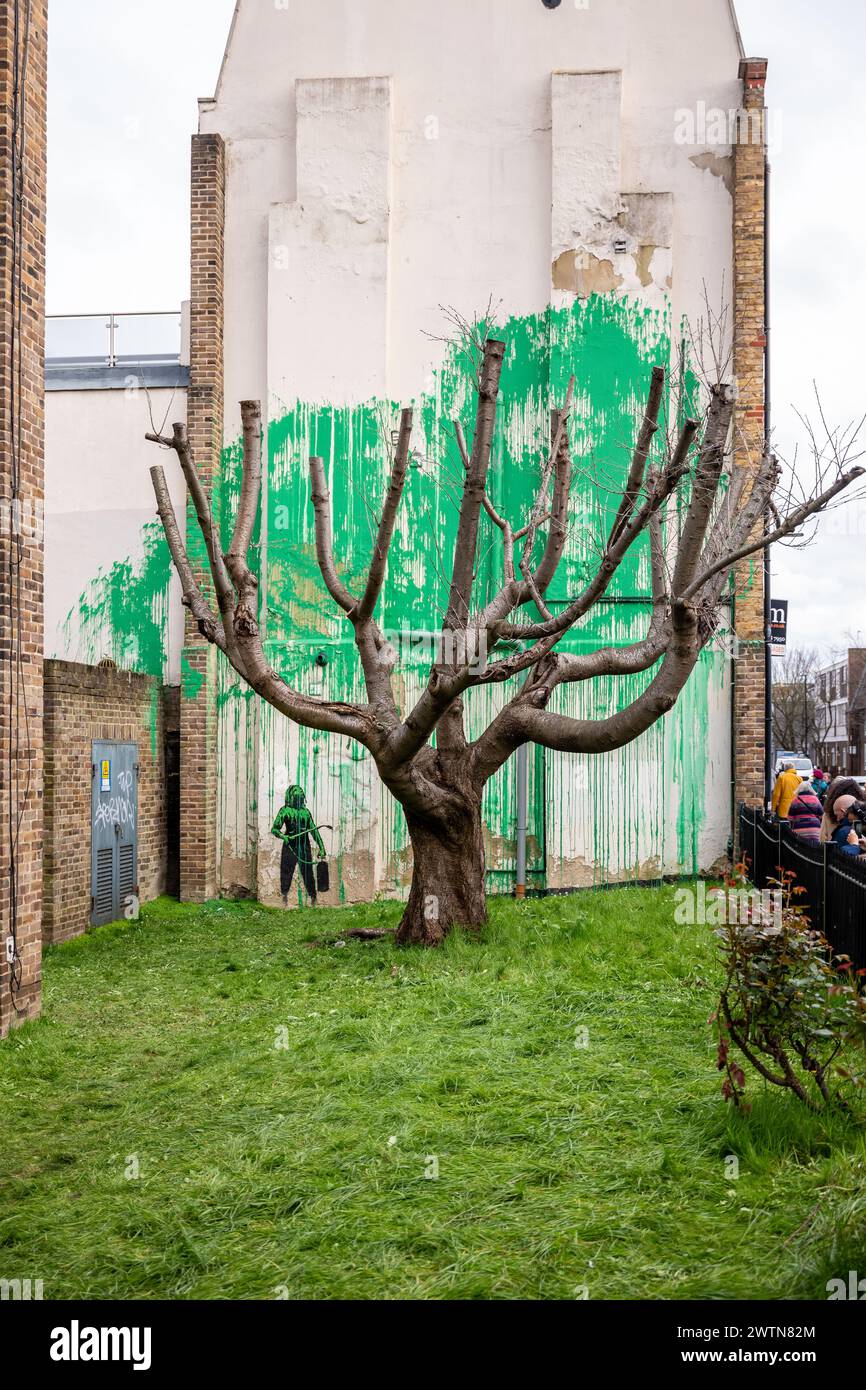 Banksy Tree artwork and street art at Christie Court, Hornsey Road ...