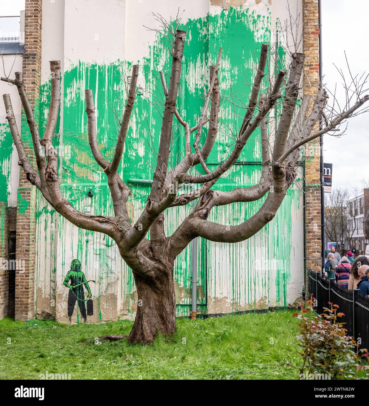 Banksy Tree artwork and street art at Christie Court, Hornsey Road ...
