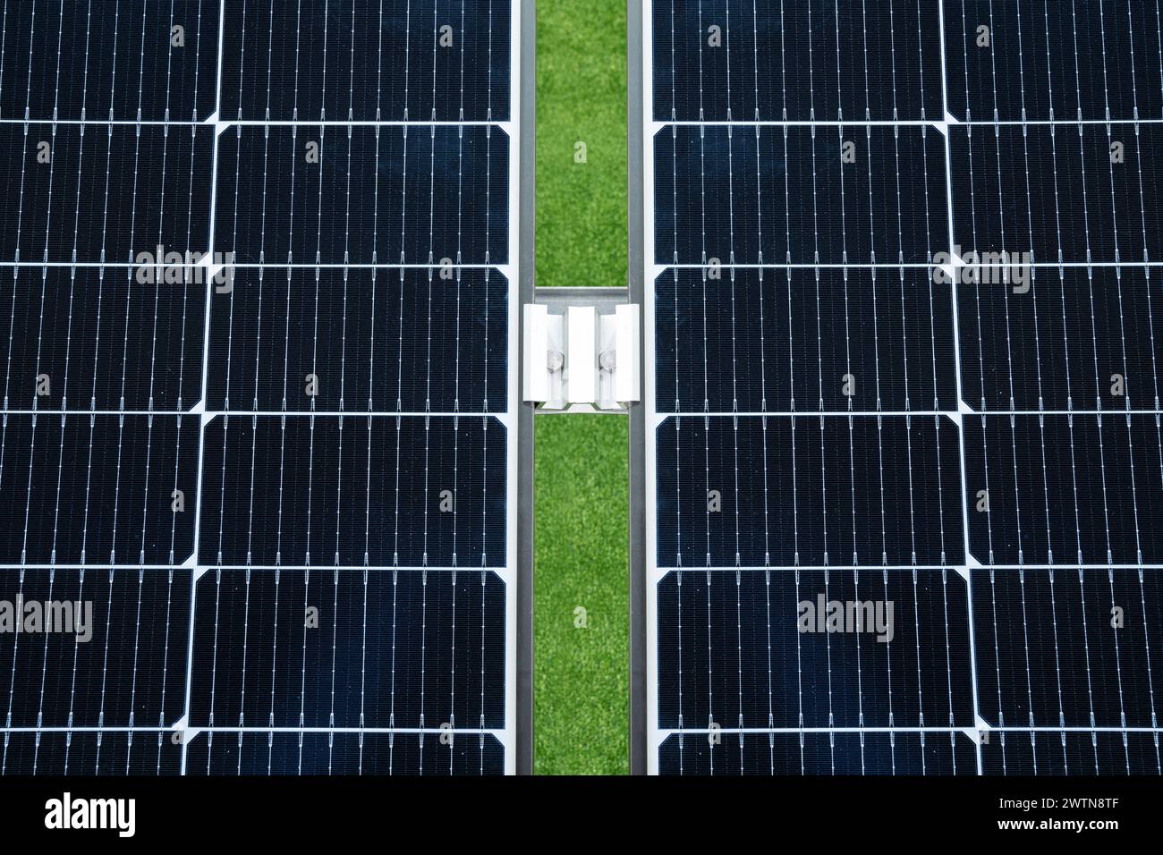 Solar panel on a background of green grass Stock Photo - Alamy