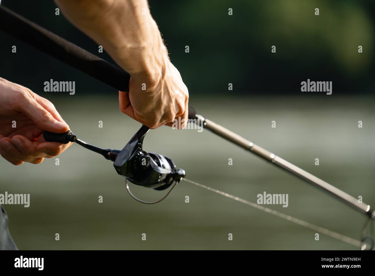Fishermans hands hi-res stock photography and images - Alamy