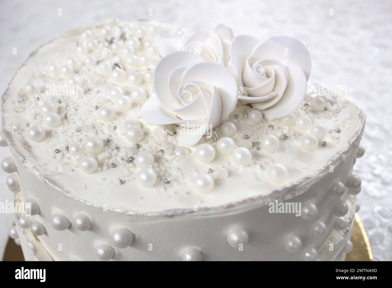 White party cake with white icing and pearls, cake design. Handmade ...