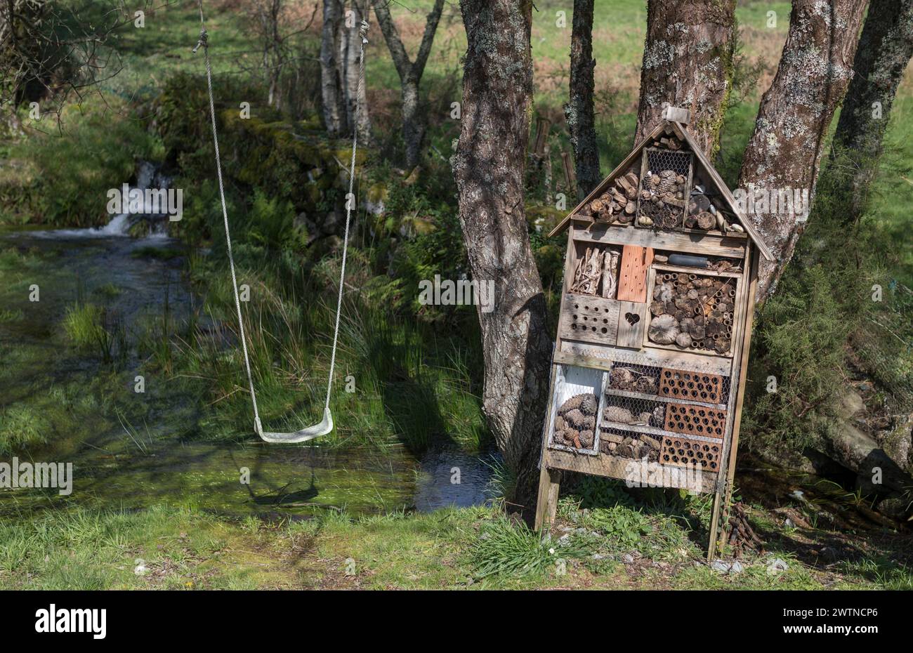 Insect hotel made from recycled material. hotel for pollinating insects ...