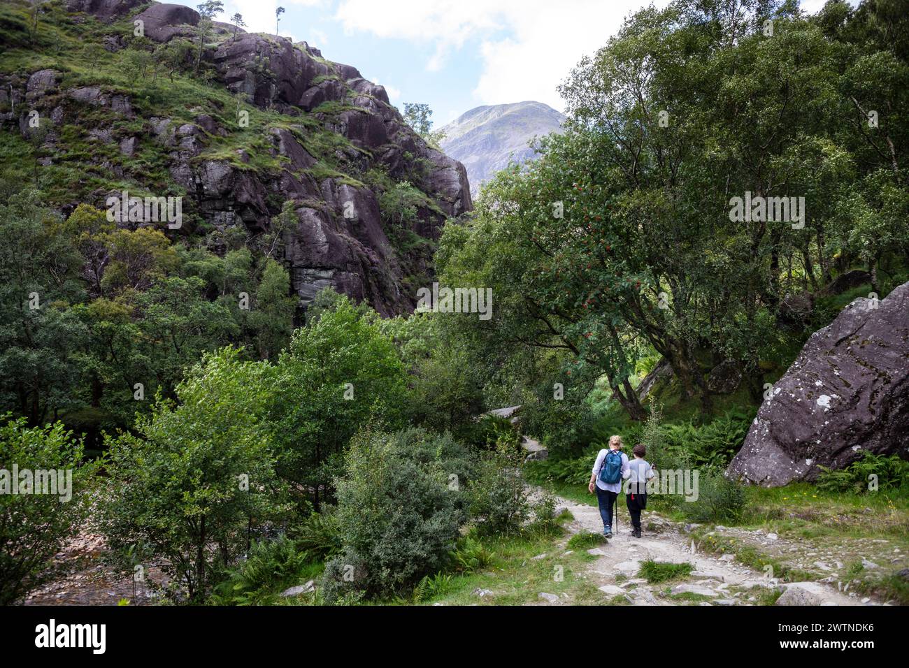 Two people on the mountain path on Ben Nevis leading to Steall ...