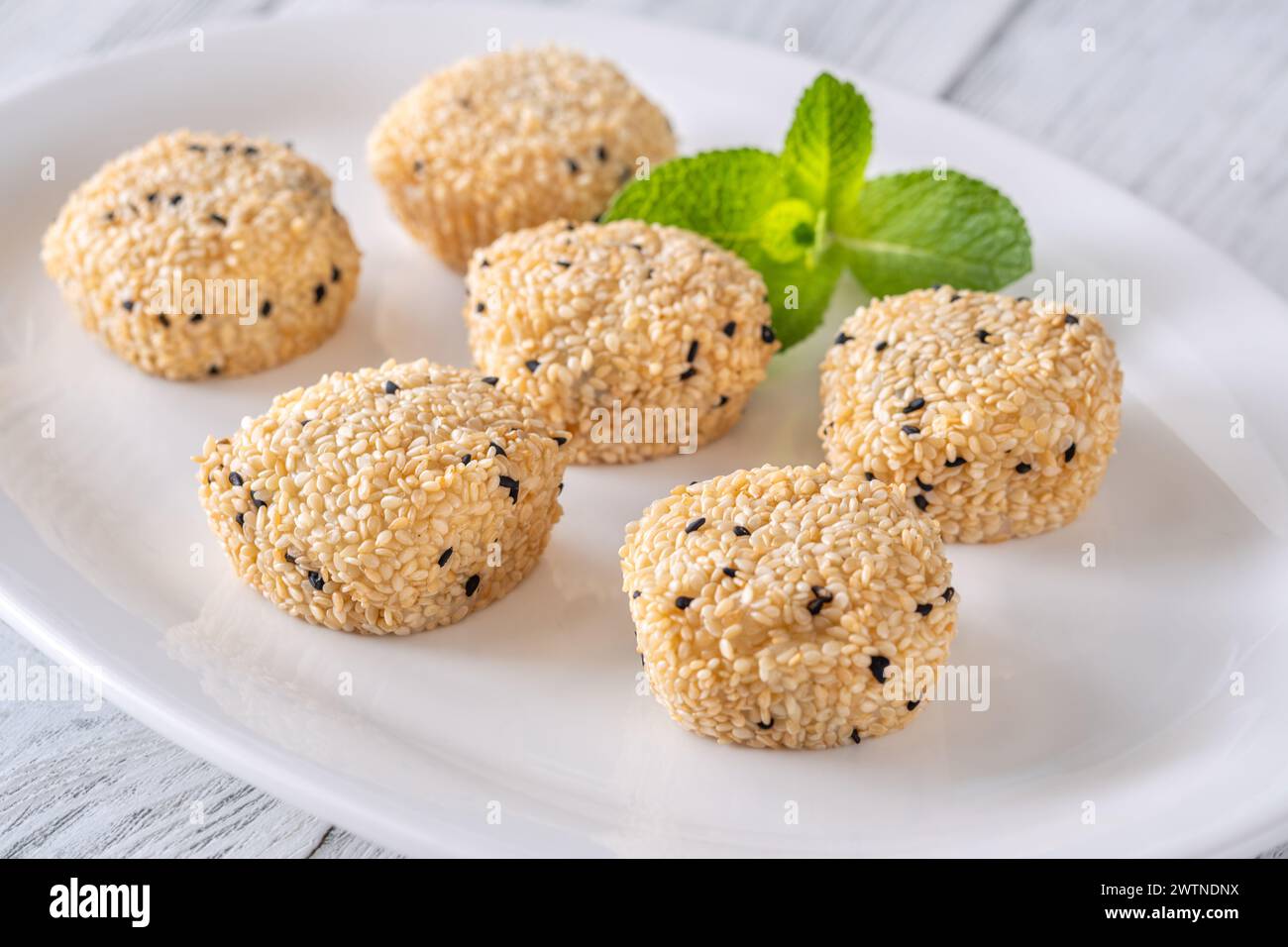 Portion of sesame mochi japanese rice cake Stock Photo - Alamy