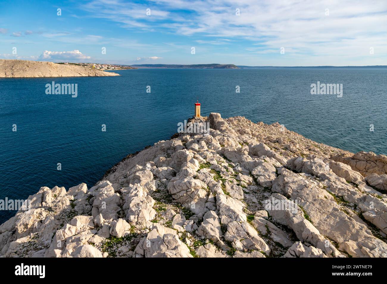 the lighthouse marks the passage through the strait Stock Photo - Alamy