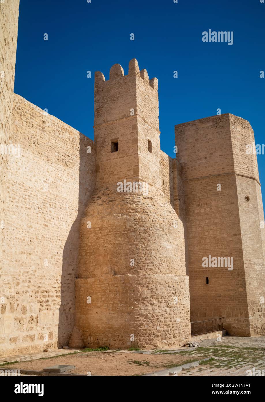 A square turret with crenellated ramparts on the outside of the 8th ...