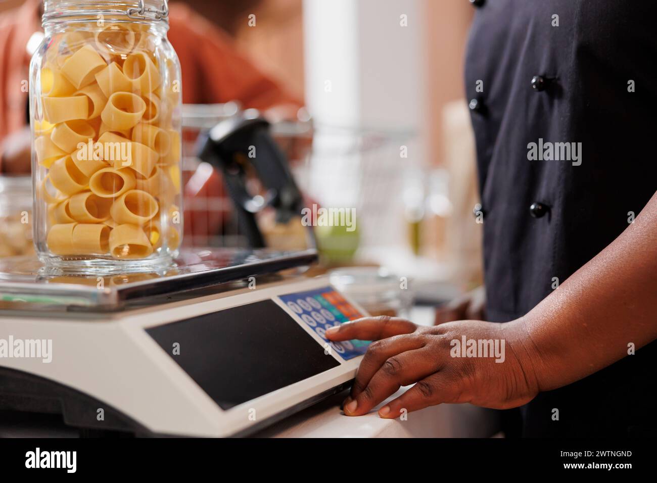 Up-close image capturing person using measuring scale, checking weight ...