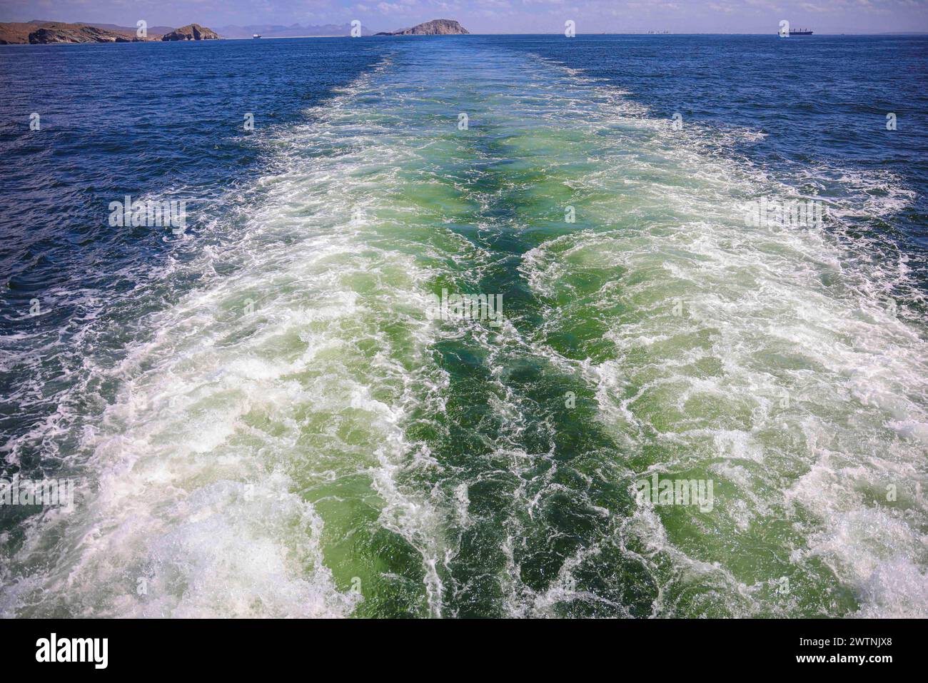 Wake in the sea Behind Big ship, prop wash of a tanker underway in open ...