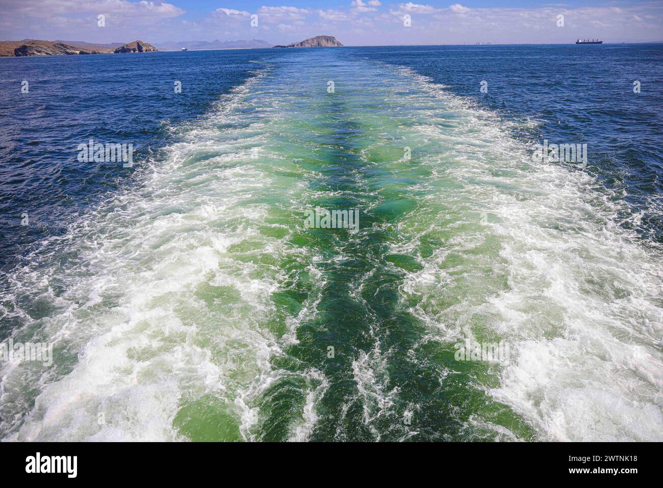 Wake in the sea Behind Big ship, prop wash of a tanker underway in open ...
