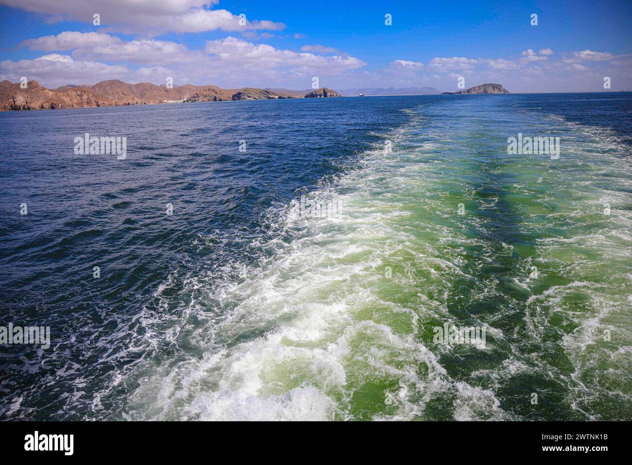 Wake in the sea Behind Big ship, prop wash of a tanker underway in open ...