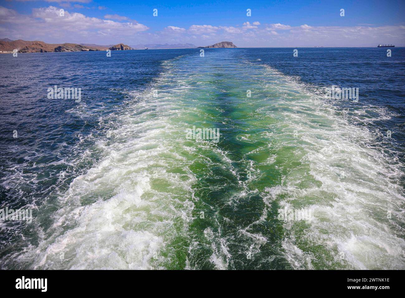 Wake in the sea Behind Big ship, prop wash of a tanker underway in open ...
