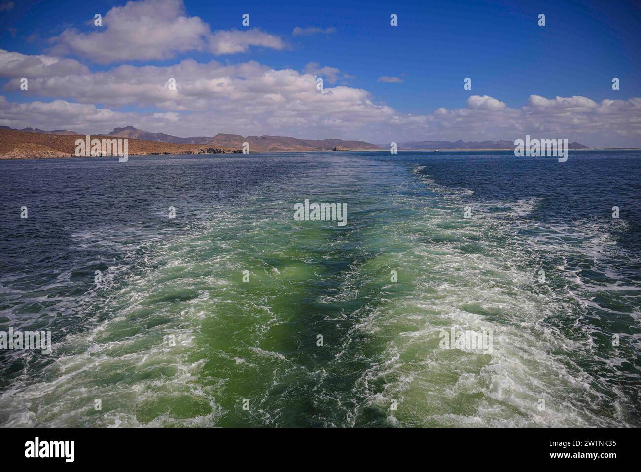 Wake in the sea Behind Big ship, prop wash of a tanker underway in open ...