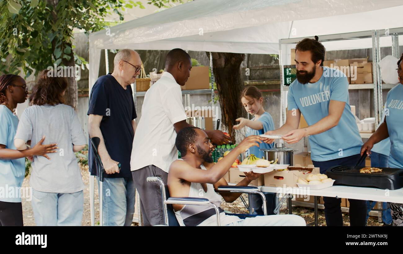 Man woman in wheelchair feeding hi-res stock photography and images - Alamy