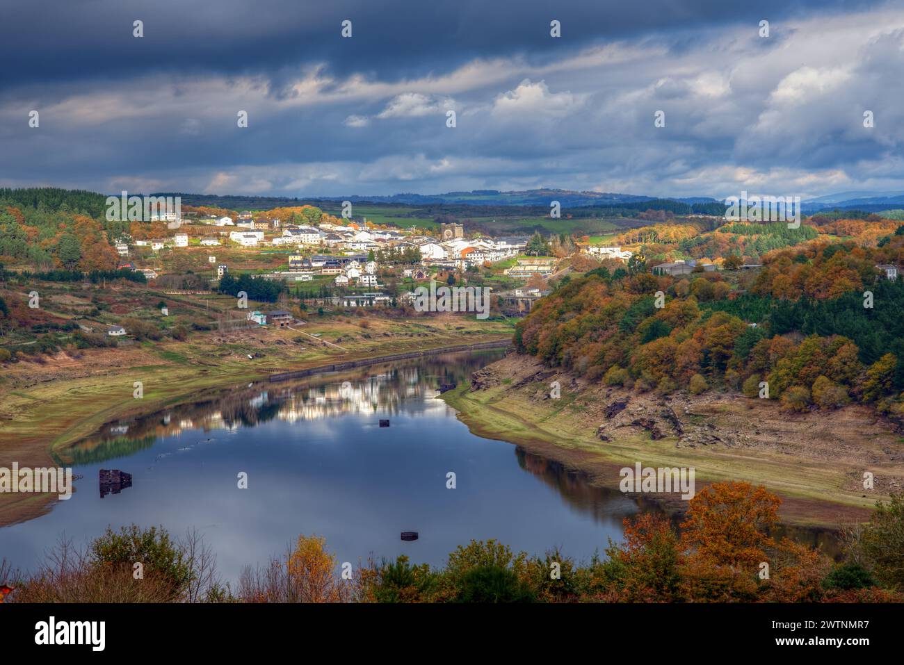 The town of Portomarin on the Camino de Santiago on the Minho River in ...