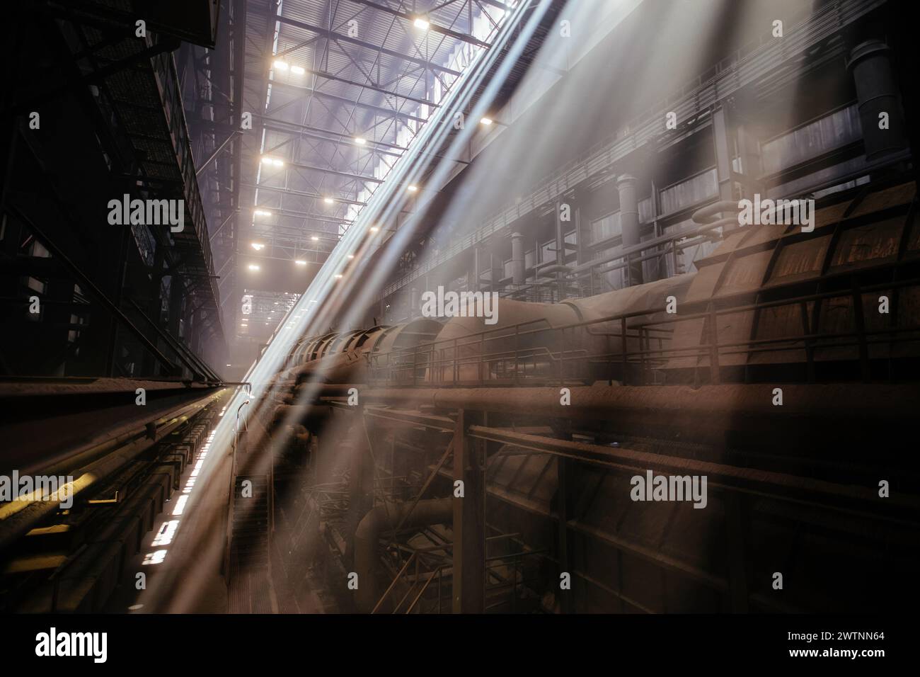 Ore pellets roasting machine at metallurgical factory Stock Photo - Alamy