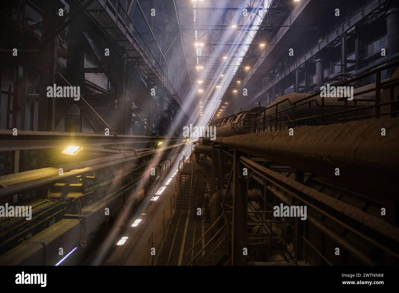 Ore pellets roasting machine at metallurgical factory Stock Photo - Alamy