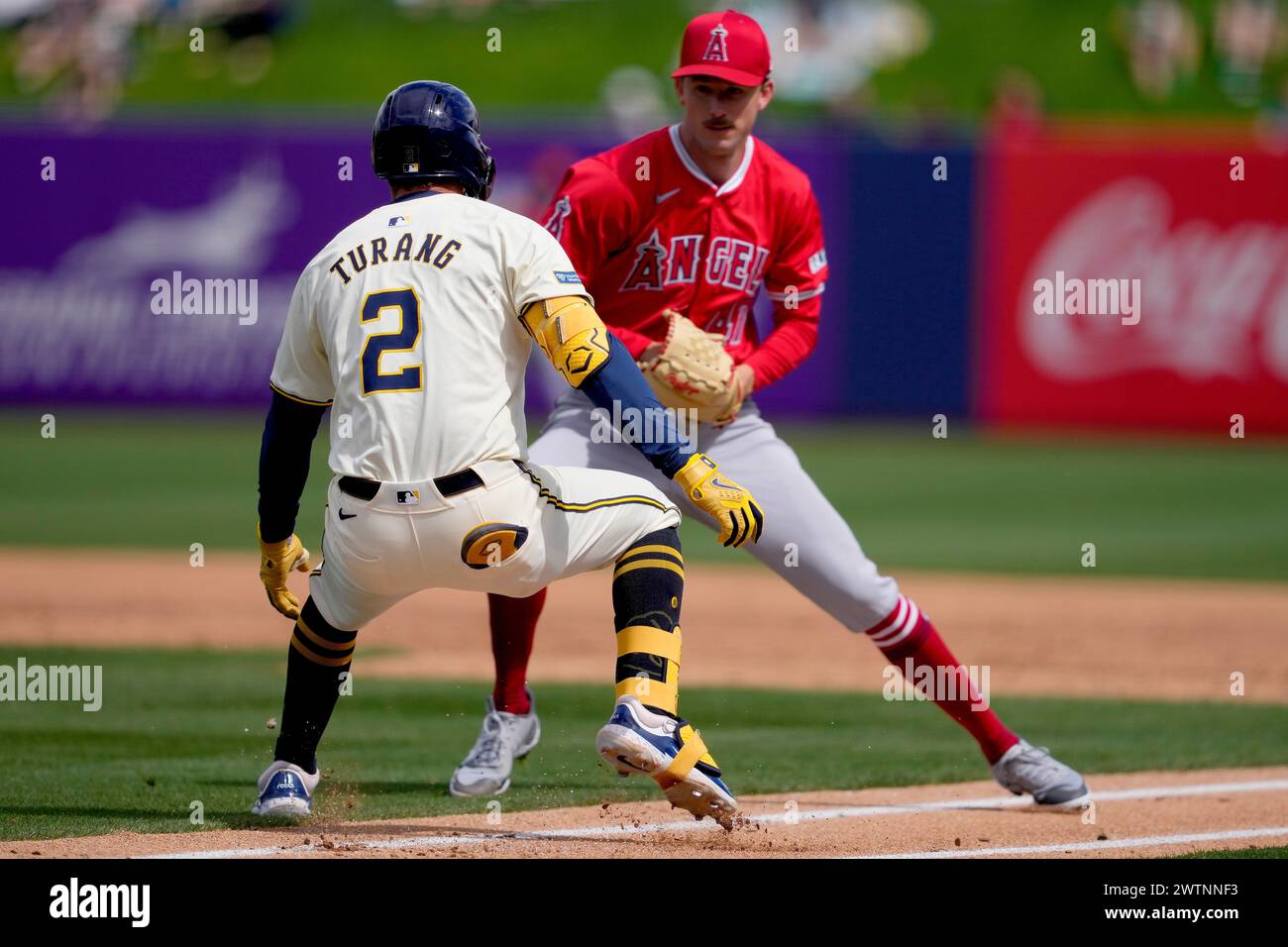 Milwaukee Brewers' Brice Turang (2) is tagged out by Los Angeles Angels ...