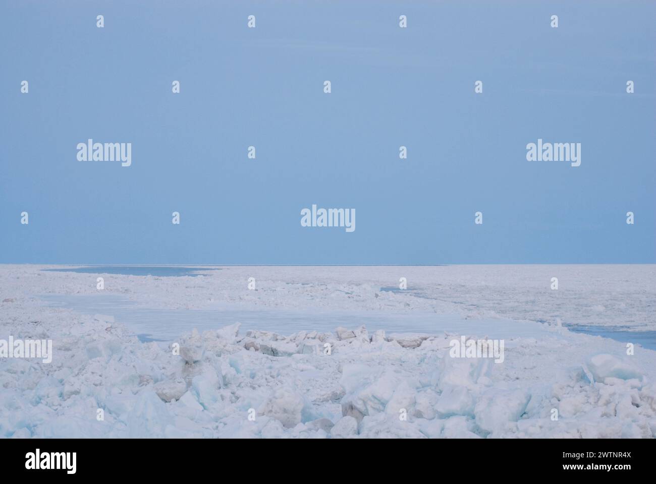 Seascape of open lead rough pack ice over the Chukchi sea in springtime ...