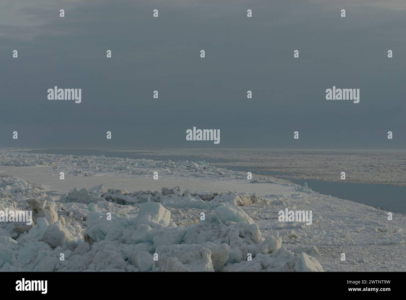 Seascape of open lead rough pack ice over the Chukchi sea in springtime ...
