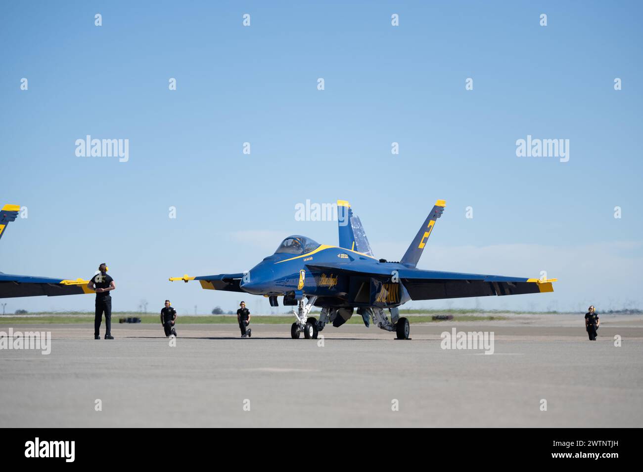 U.S. Navy Blue Angels #2 crew members prepare for takeoff during the ...