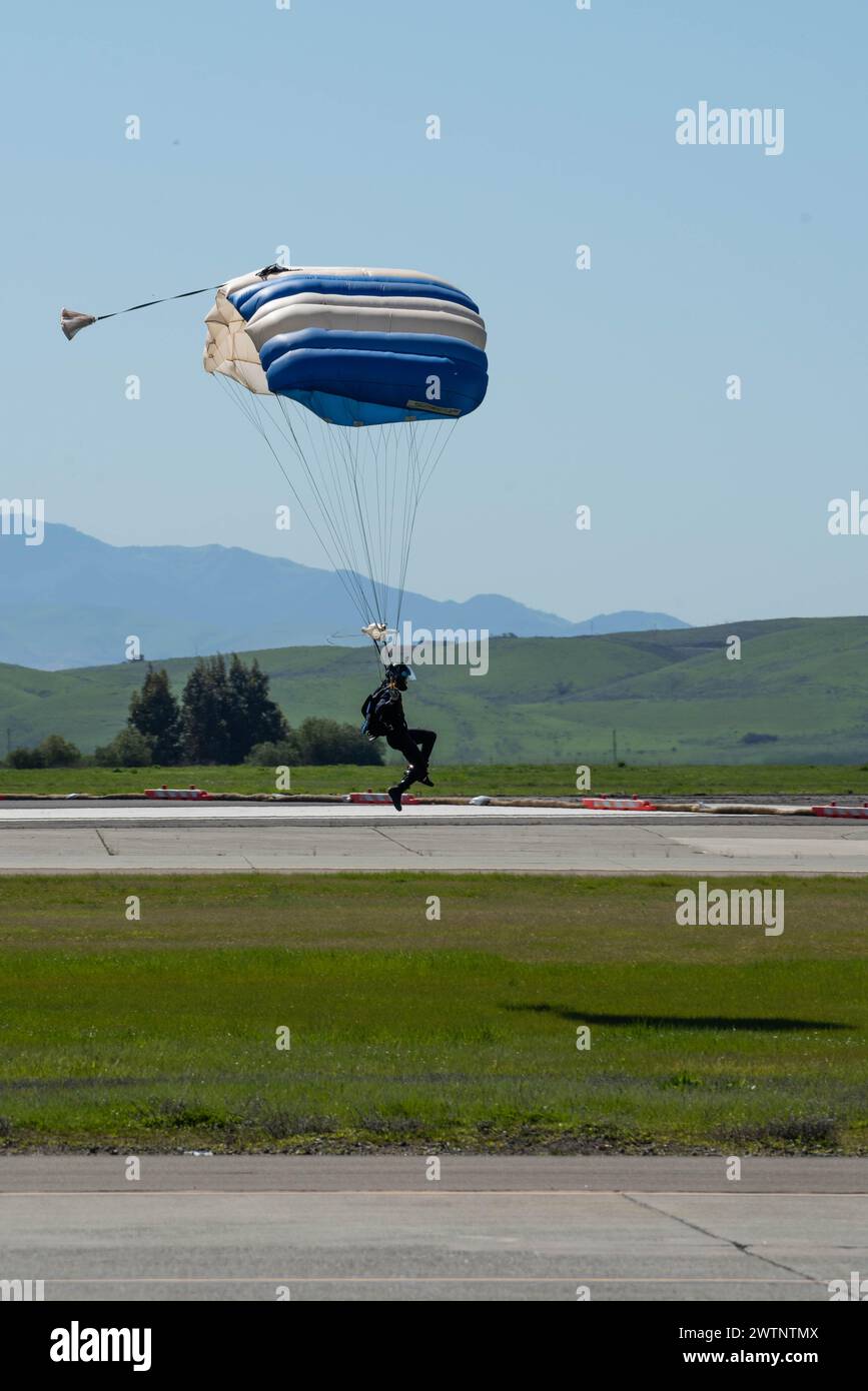 A member of the U.S. Air Force Academy Wings of Blue Parachute Team ...