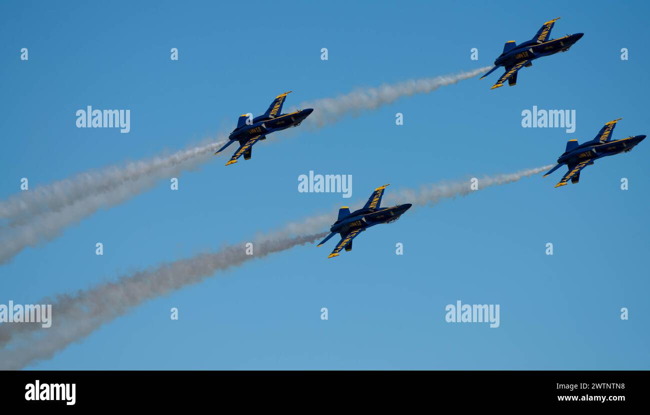F/A-18 Super Hornets assigned to the Blue Angels perform aerobatic ...