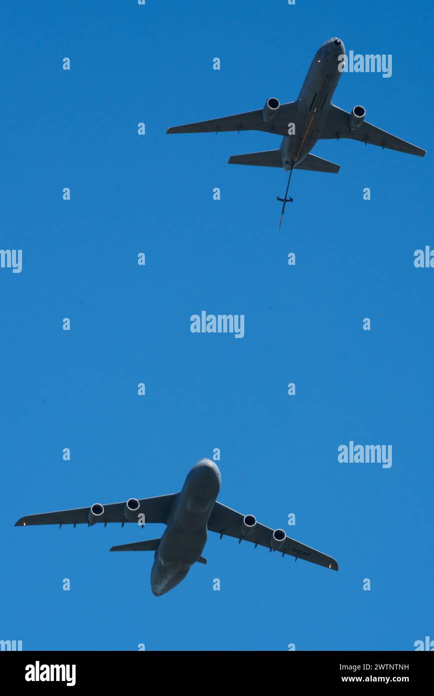 A U.S. Air Force KC-10 Extender and a C-5M Super Galaxy perform an ...