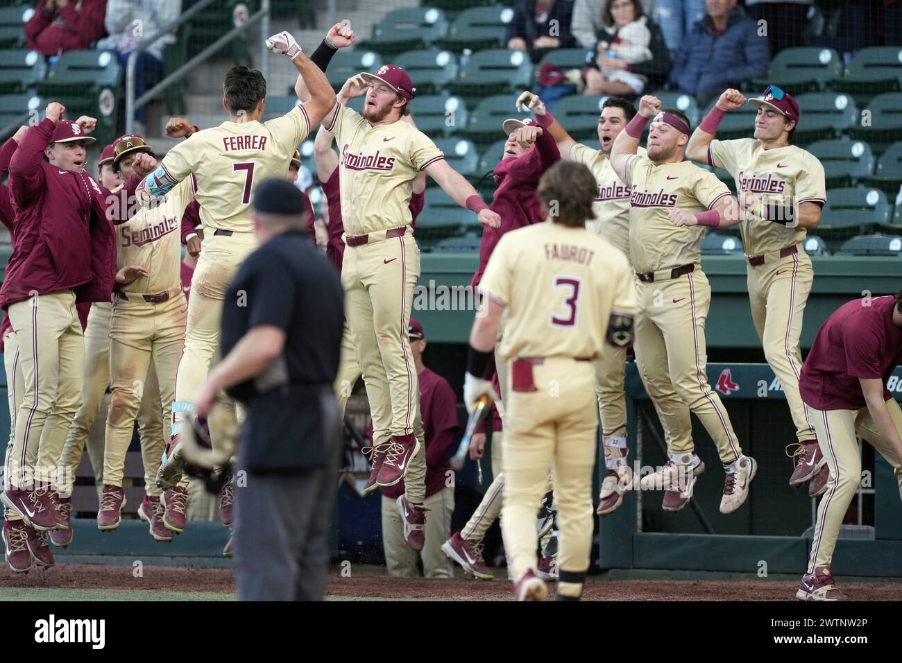 Florida State teammates celebrate a seventh-inning home run by ...