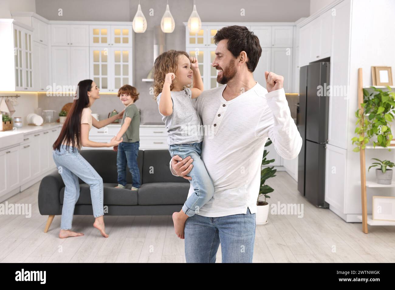 Man woman children dancing home hi-res stock photography and images - Alamy