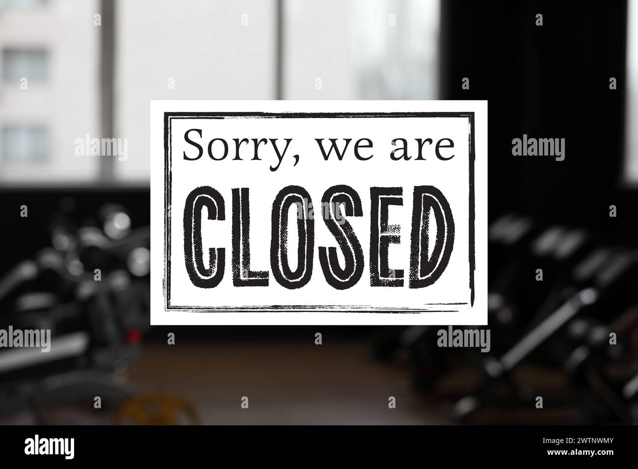 Sorry we are closed sign against blurred background Stock Photo - Alamy