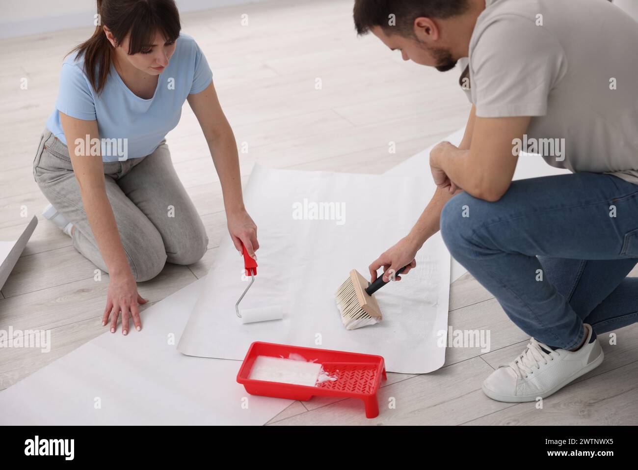 Applying glue hi-res stock photography and images - Alamy