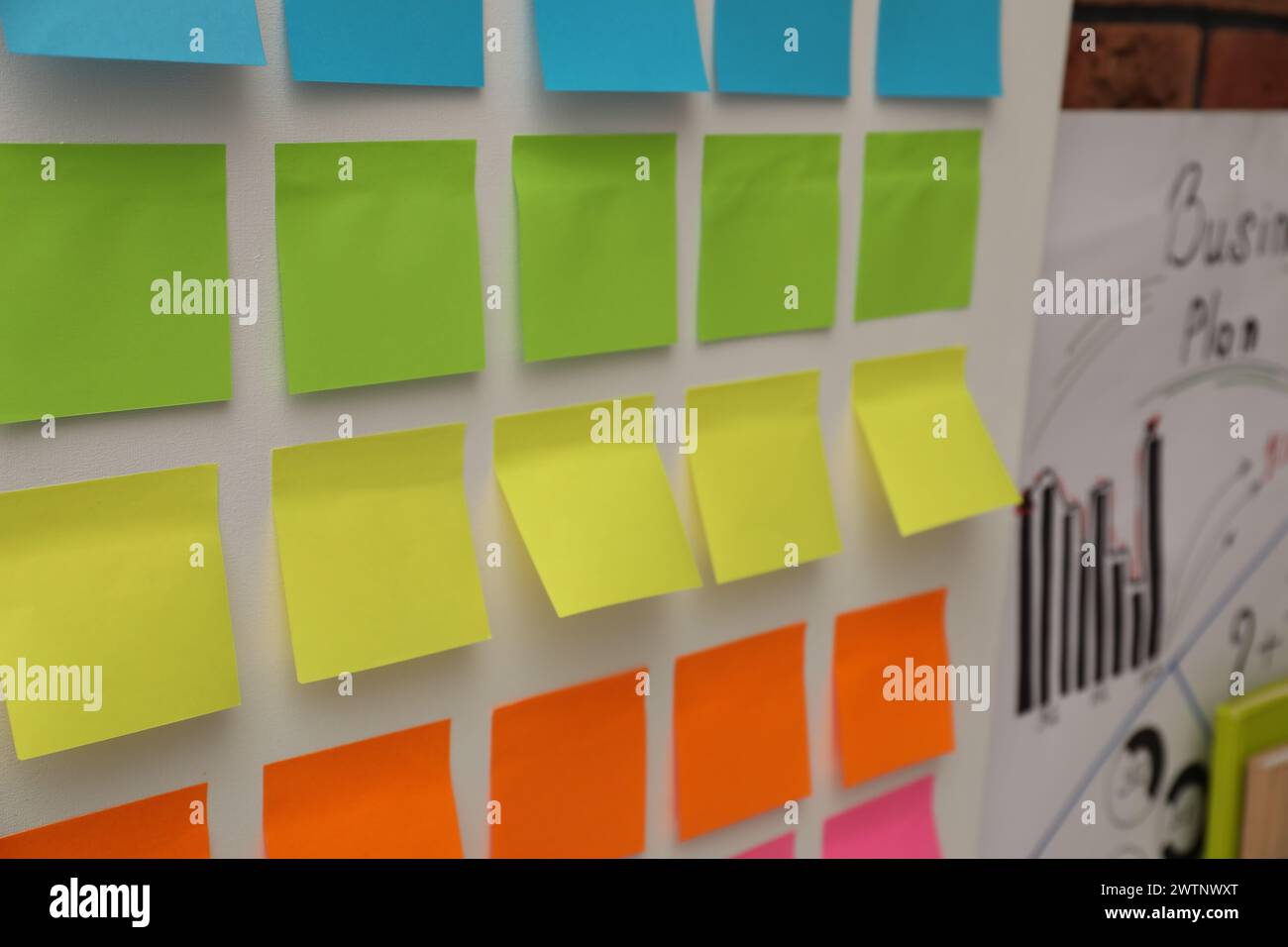 Blank colorful paper notes on white board, closeup Stock Photo - Alamy