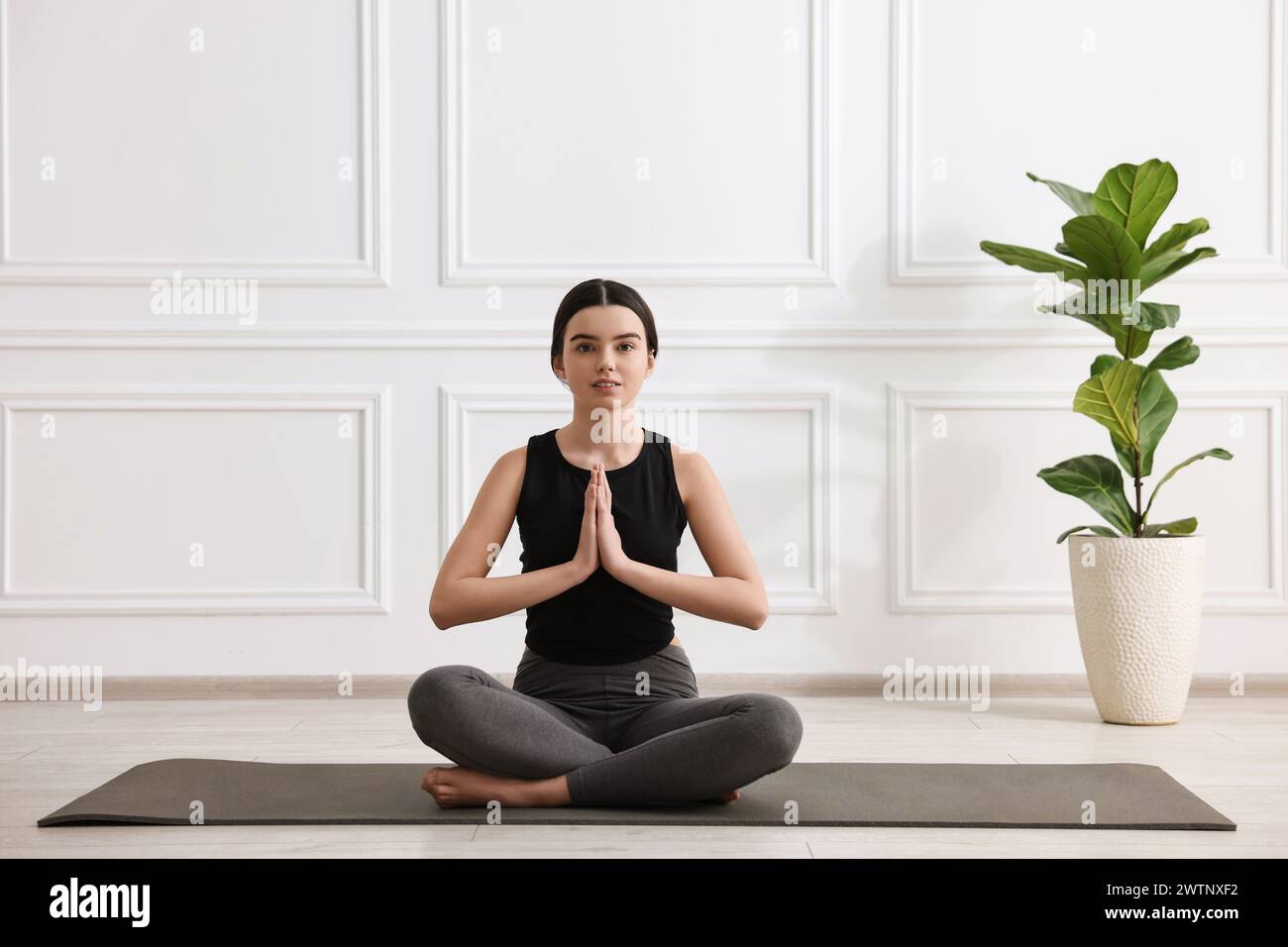 Caucasian teen girl meditating hi-res stock photography and images - Alamy
