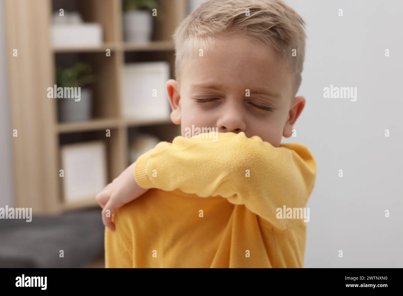 Child coughing elbow hi-res stock photography and images - Alamy