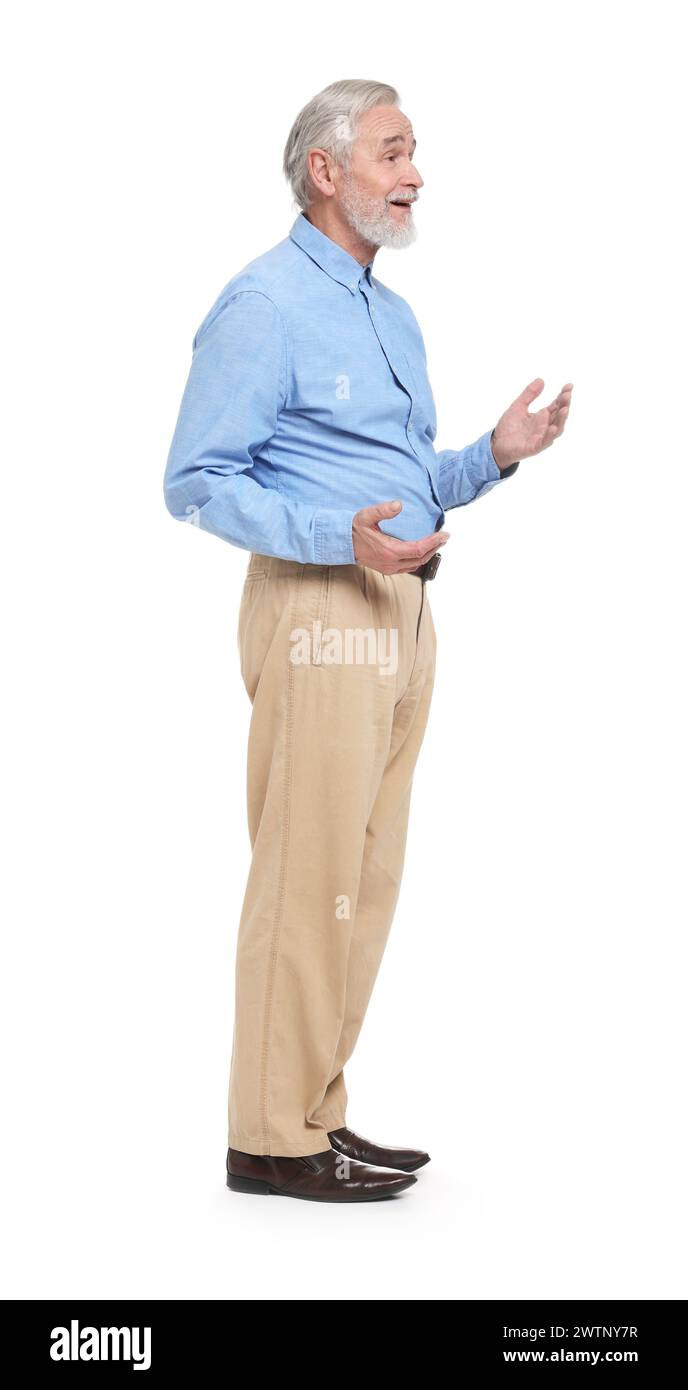 Senior man greeting someone on white background Stock Photo - Alamy