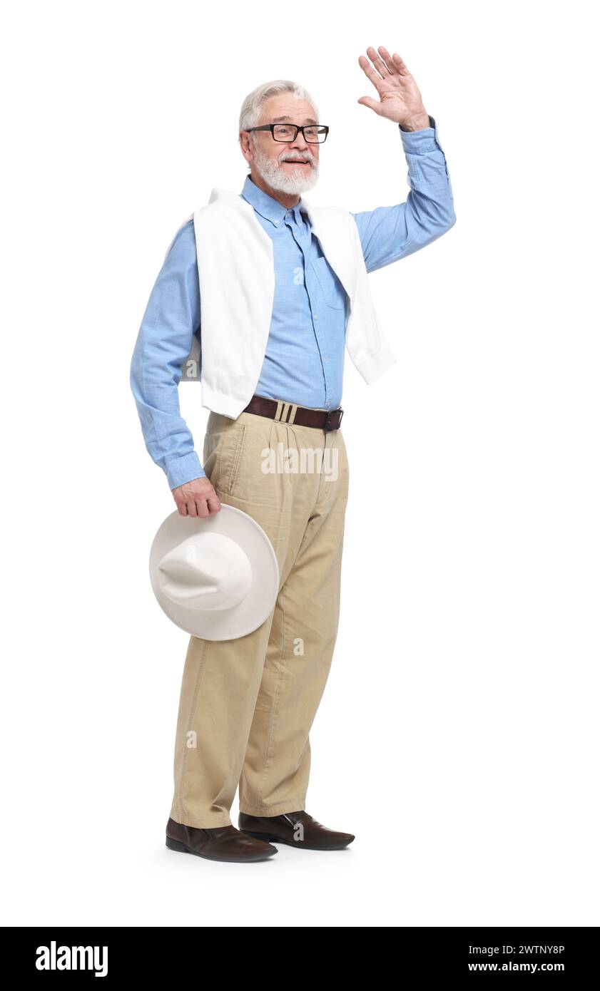 Senior man waving hand on white background Stock Photo - Alamy