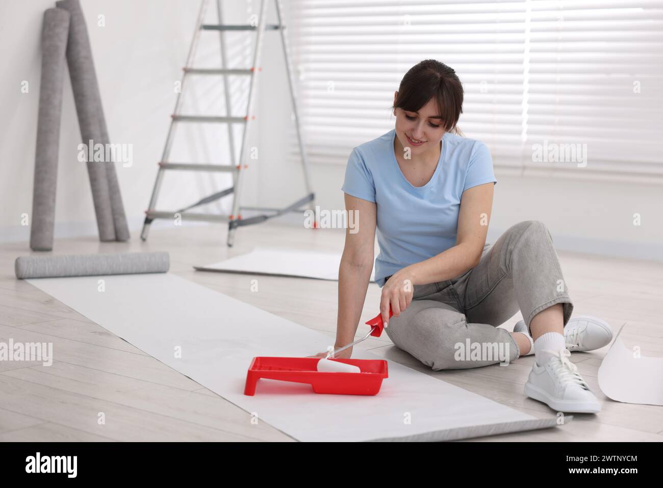 Applying glue hi-res stock photography and images - Alamy