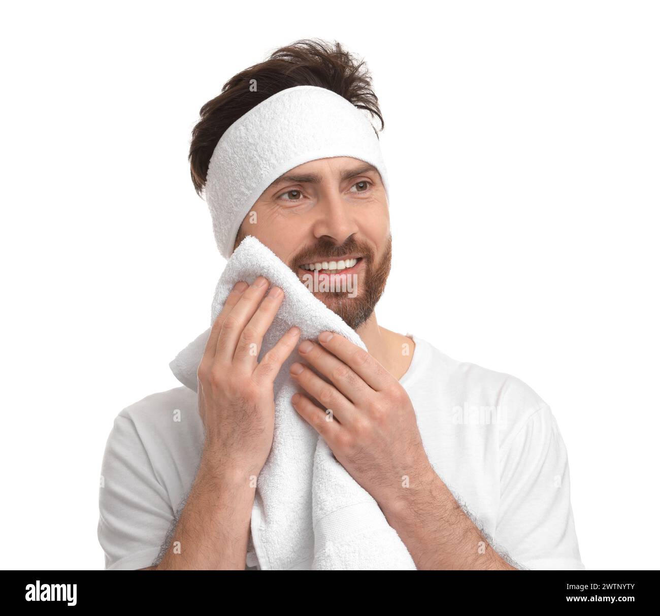 Washing face. Man with headband and towel on white background Stock ...