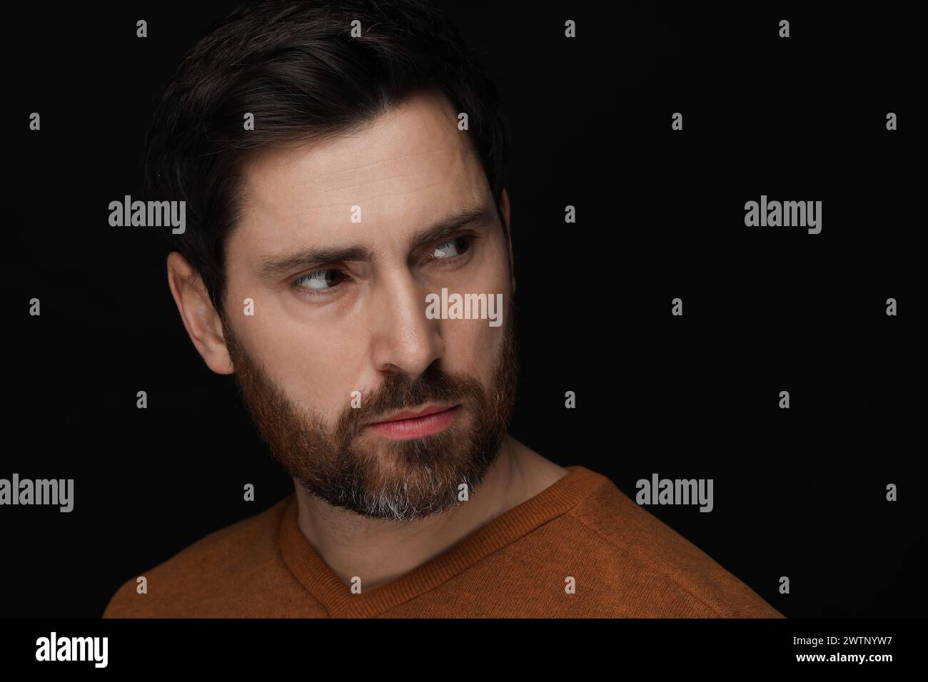 Evil eye. Man with scary eyes on black background, closeup and space ...