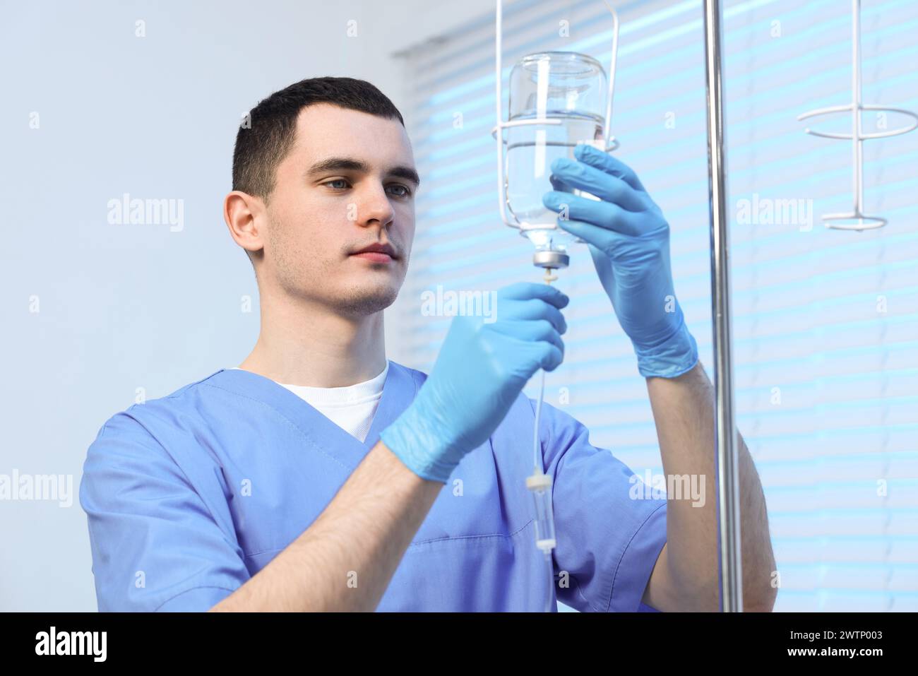 Nurse drip stand hi-res stock photography and images - Alamy