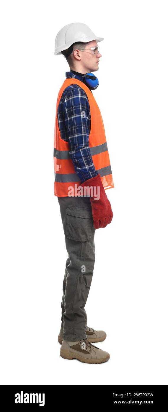 Young man wearing safety equipment on white background Stock Photo - Alamy