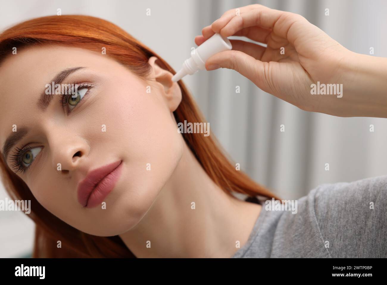 Ear drops hi-res stock photography and images - Alamy