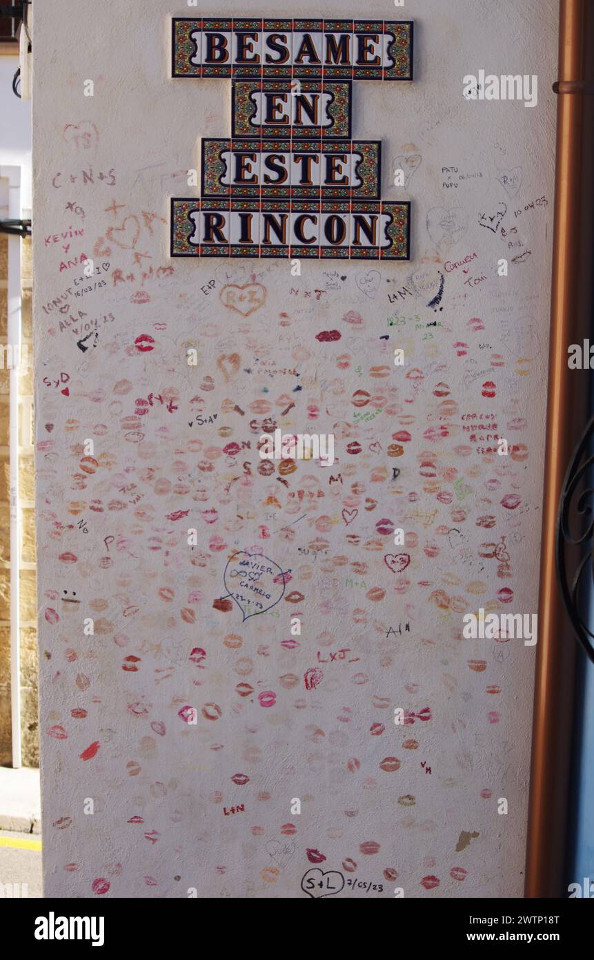 A kissing wall in Denia. It's a tiny corner covered with lipstick ...