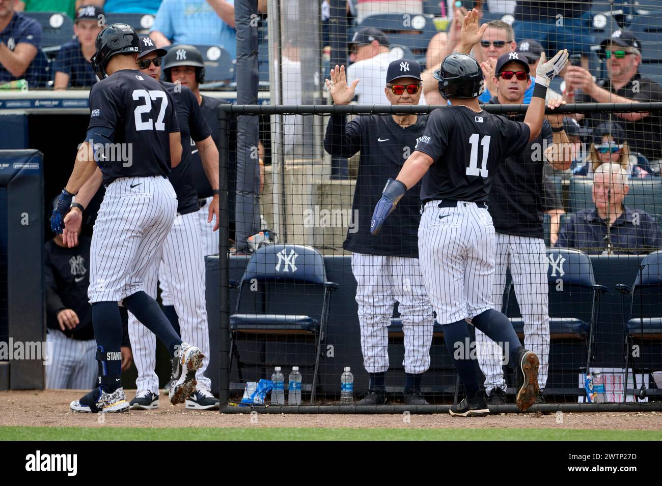 New York Yankees Giancarlo Stanton (27) and Anthony Volpe (11) high ...
